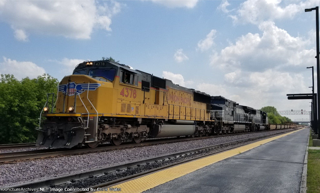 UP 4378 leads a west bound through Elburn, IL